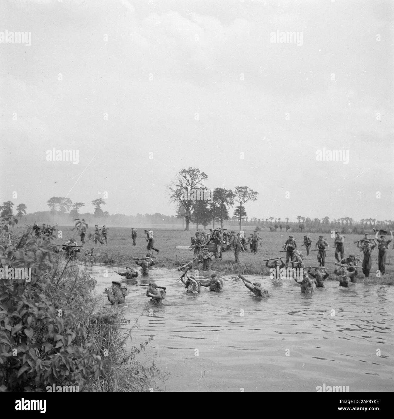 Military Reportage A military exercise. A river must be crossed ...