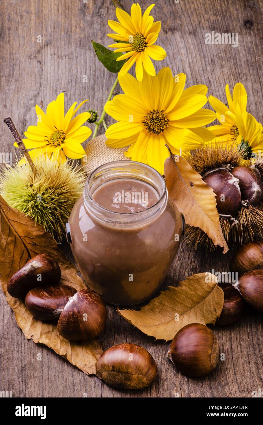 on the rustic table, with autumn colors, spreadable chestnut jam, in ...