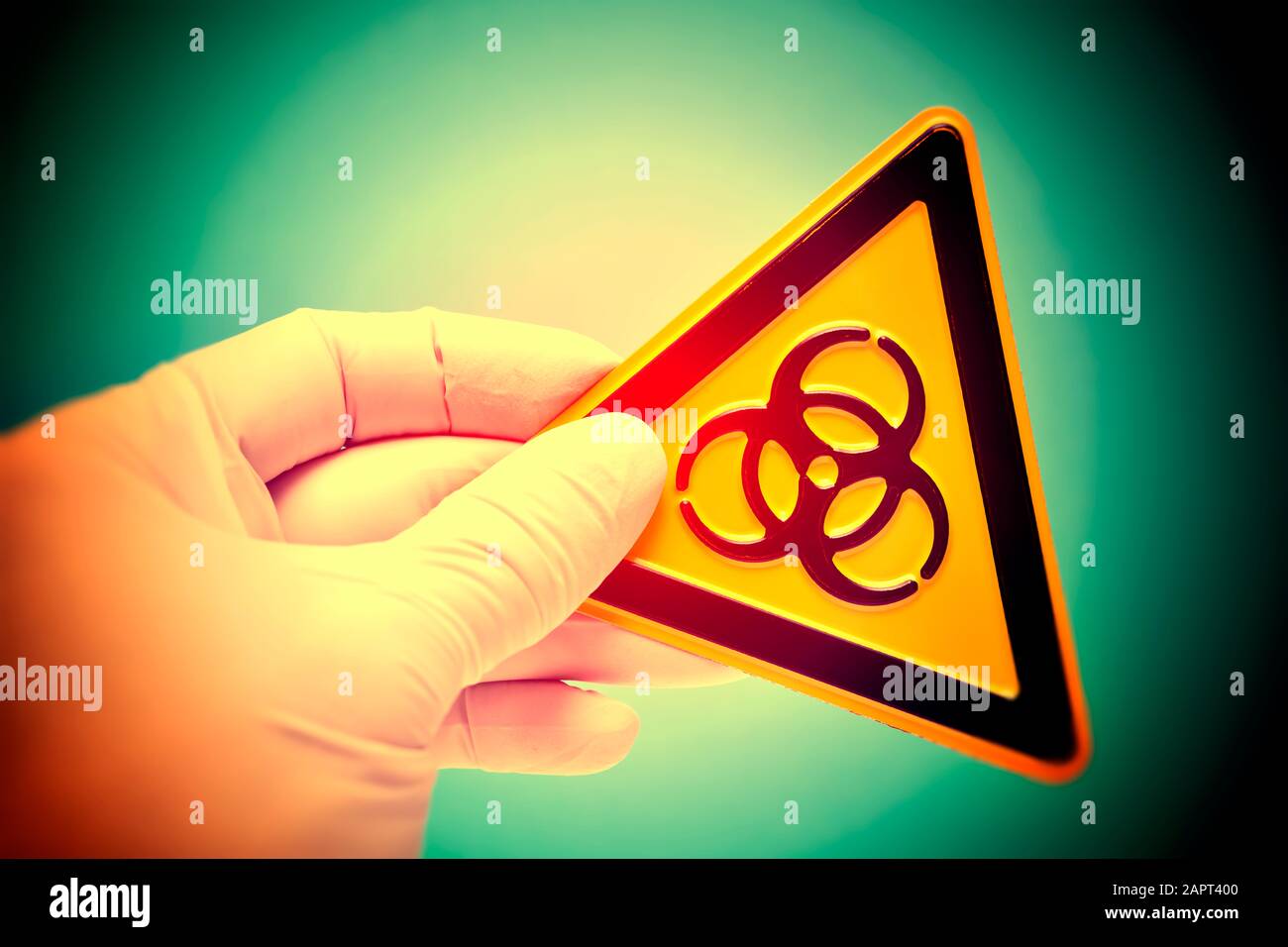 Hand holding biohazard sign, coronavirus outbreak Stock Photo - Alamy