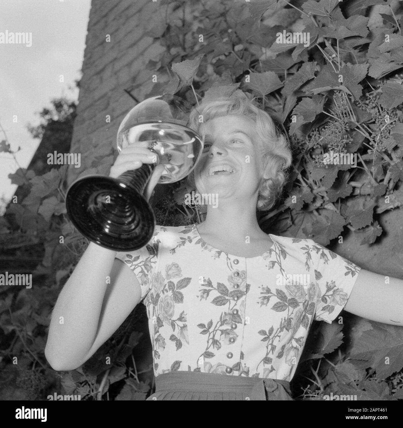 Wine women glass Black and White Stock Photos & Images - Alamy
