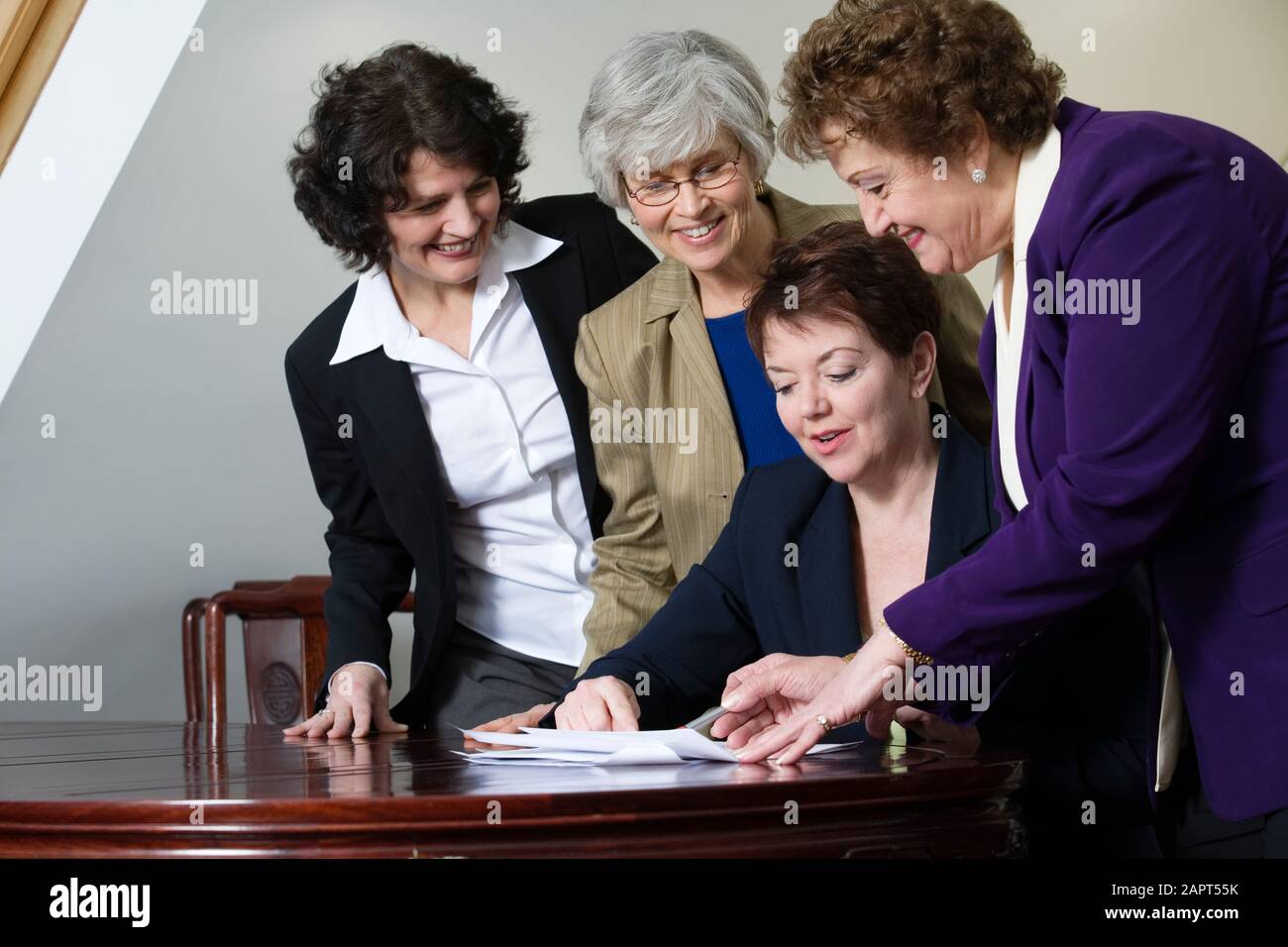 View of business women discussing Stock Photo - Alamy