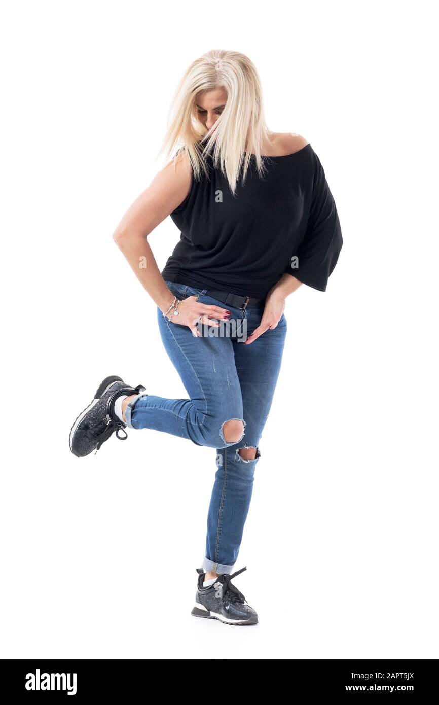 Vitality concept of playful middle aged woman in fifties posing and ...