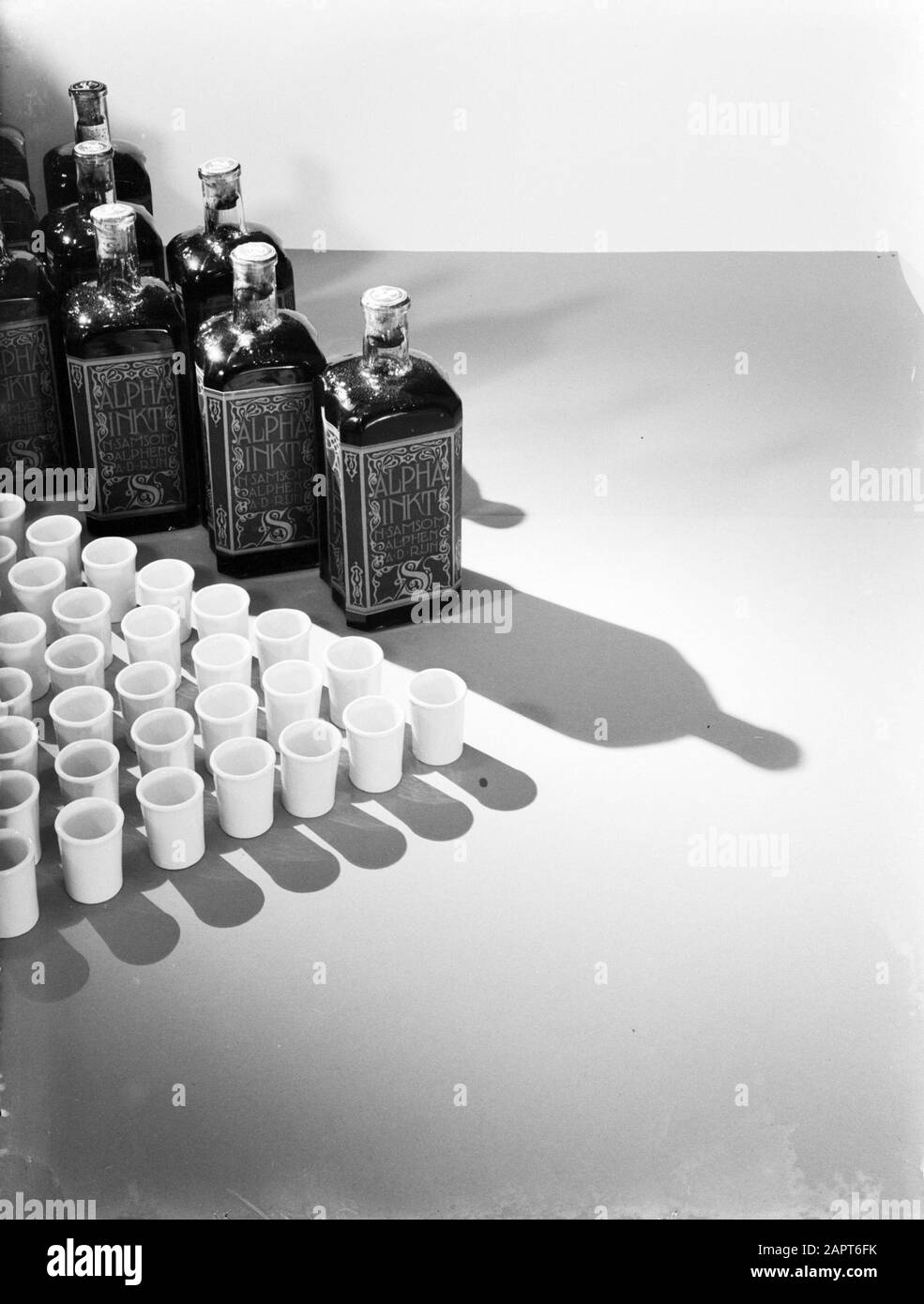 Advertising Photography Bottles Alpha ink with adjoining ink jars ...