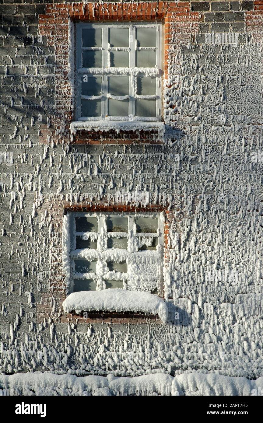 Frost and rime ice covered windows and brick wall Stock Photo - Alamy