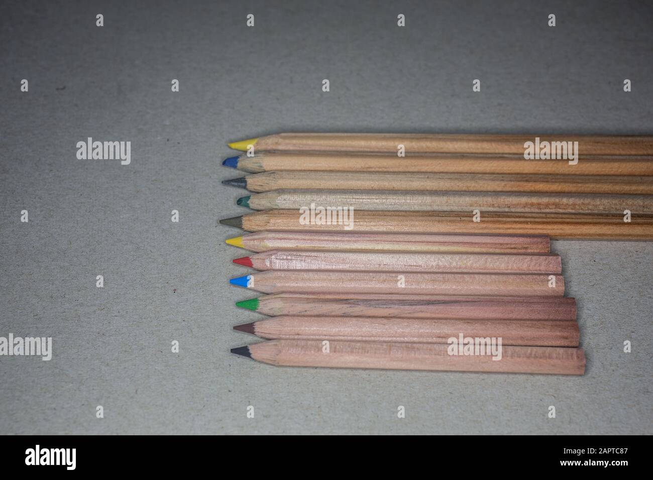 wooden crayons of different colors Stock Photo - Alamy