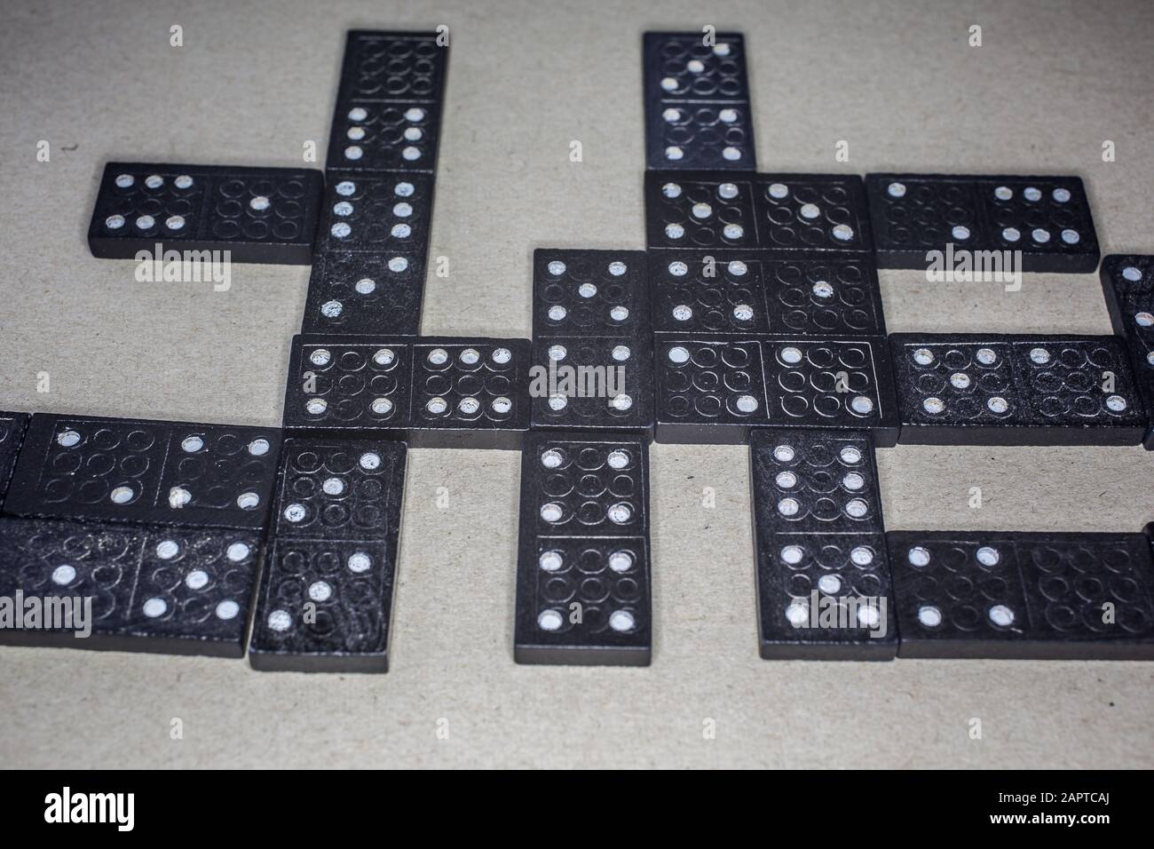 black domino stones ridden Stock Photo - Alamy