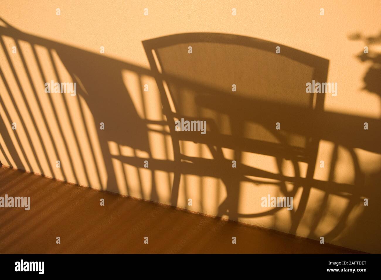 Shadow of chairs and a table on the wall of a tourist resort Stock ...