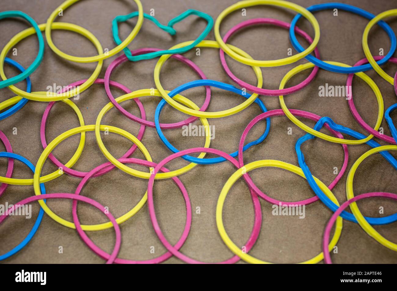 Green elastic rubber band stretched hi-res stock photography and images ...