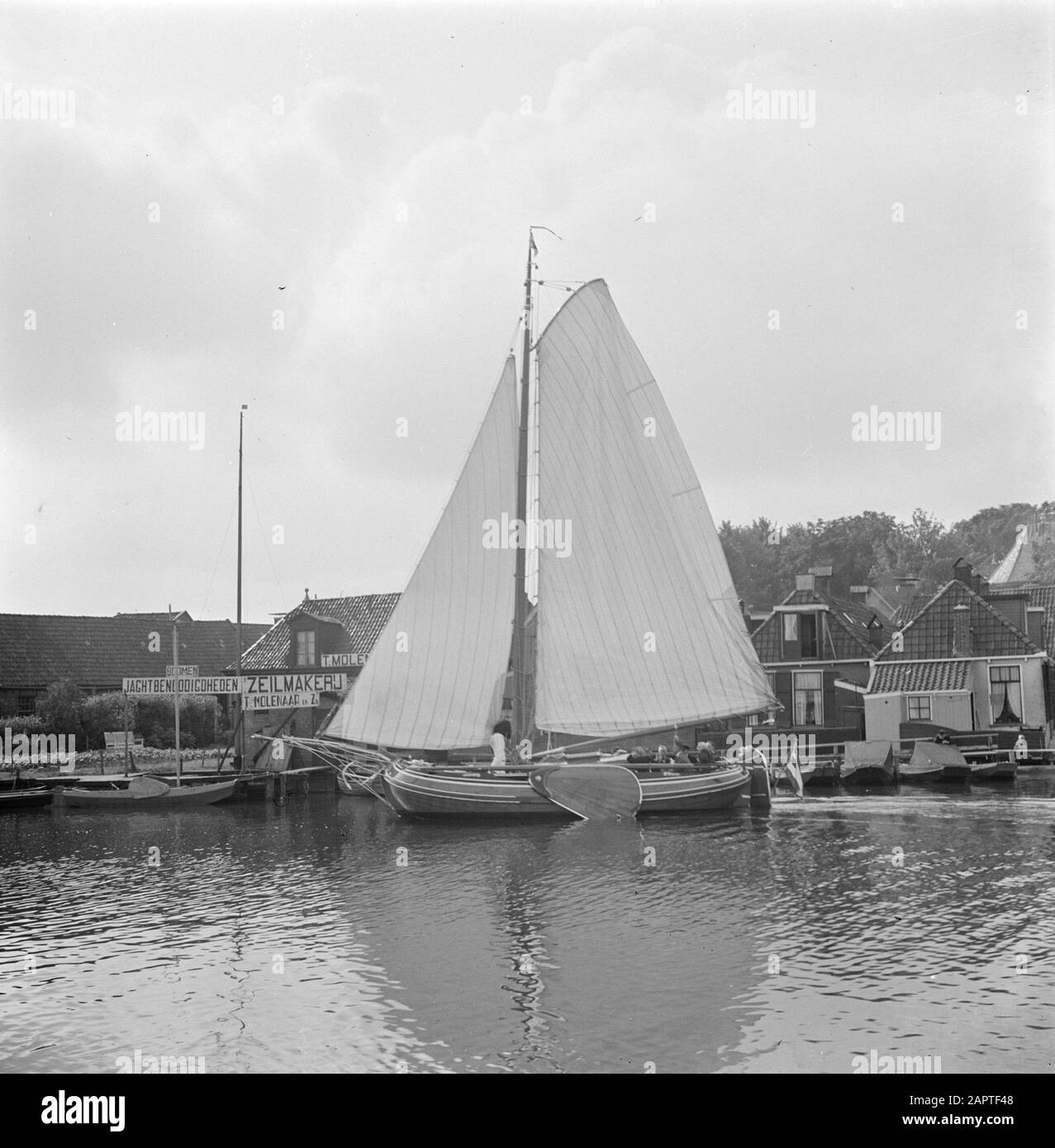 Friesland Grouw. Passing tjalk; in the background a sailmakerij Date ...