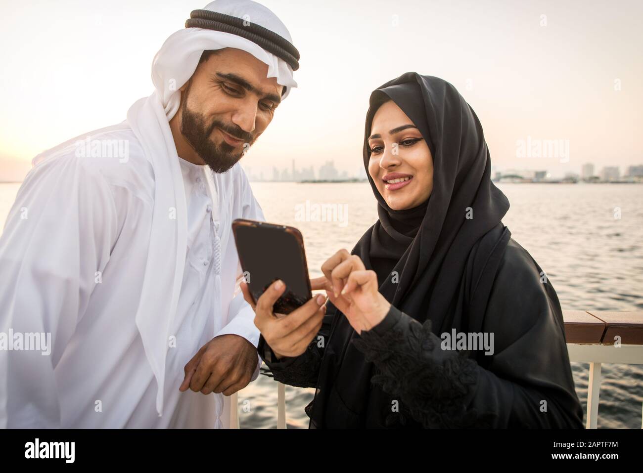 Beautiful middle eastern couple dating outdoors in Dubai - Married pair ...