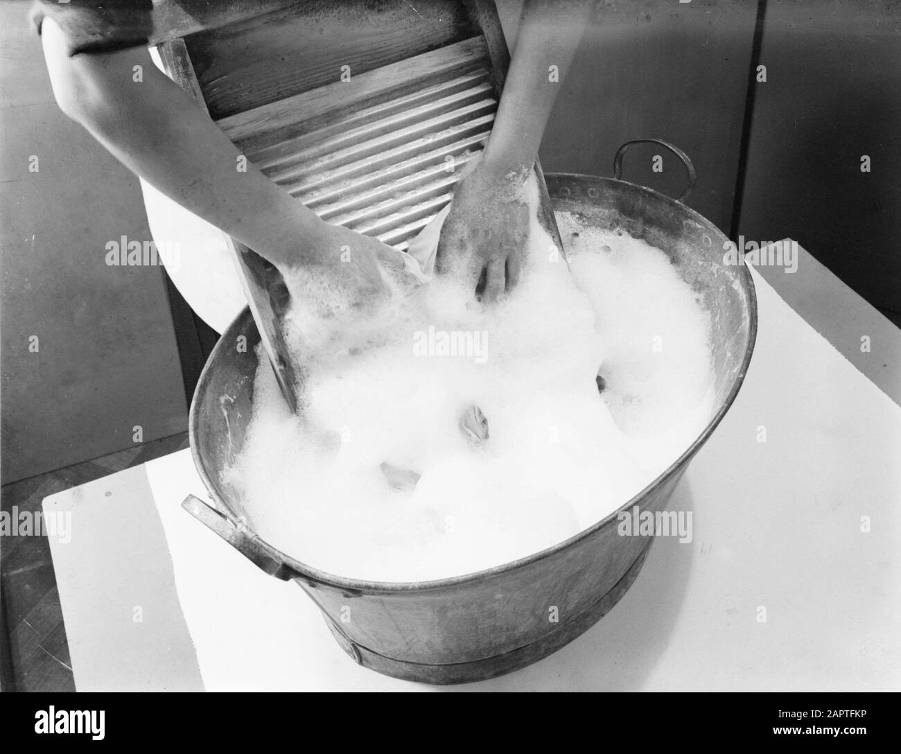 Woman washing hands and soap Black and White Stock Photos & Images - Alamy