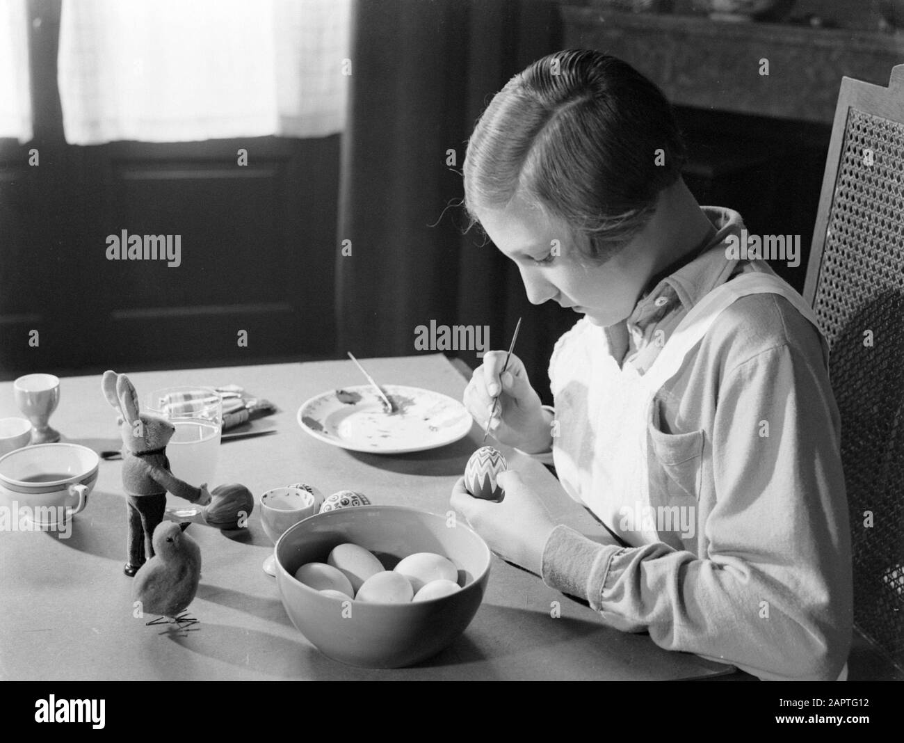 Hans paints Easter eggs Date: 1931 Keywords: eggs, girls, brushes ...