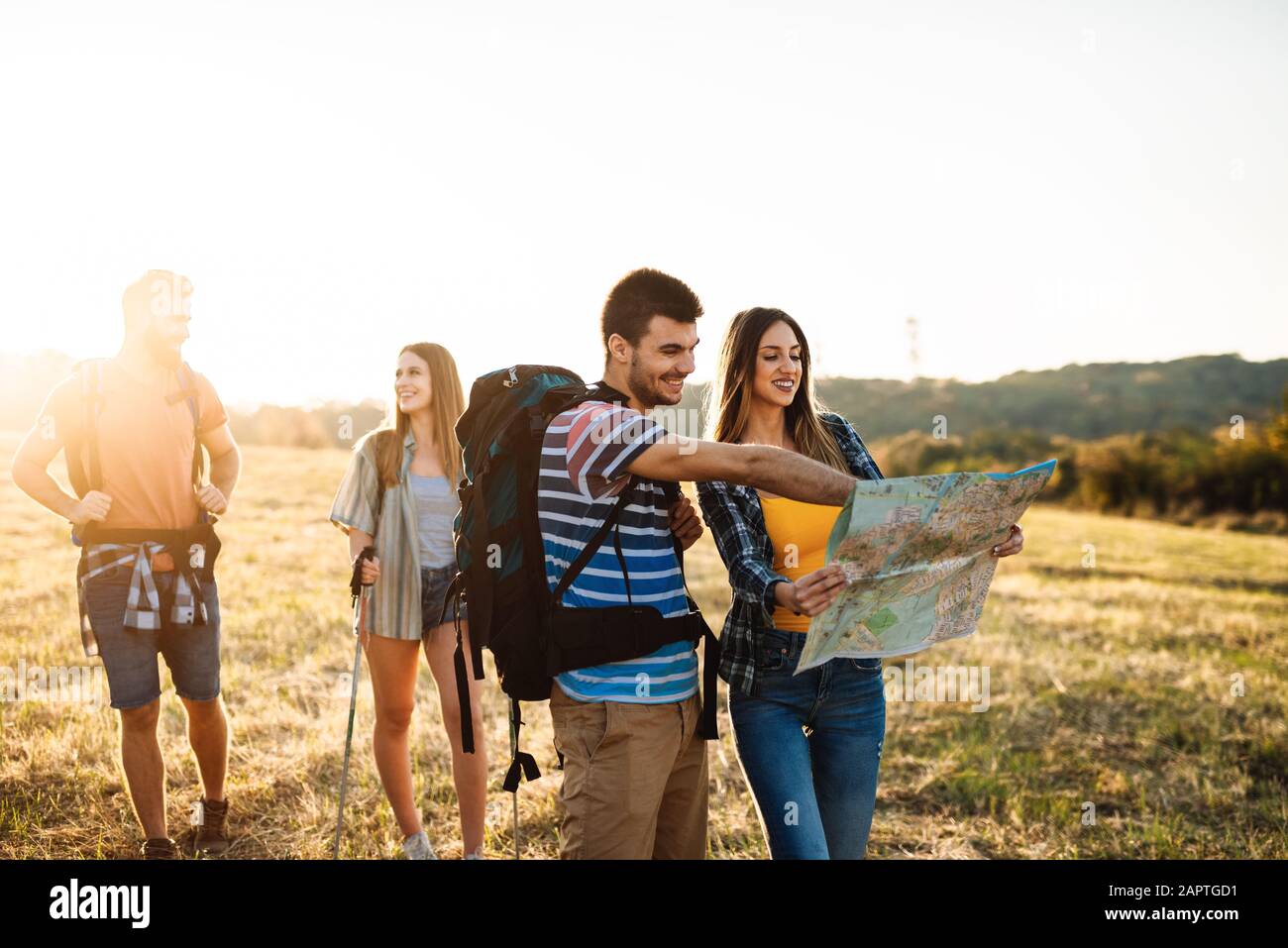 adventure, travel, tourism, hike and people concept - group of smiling ...