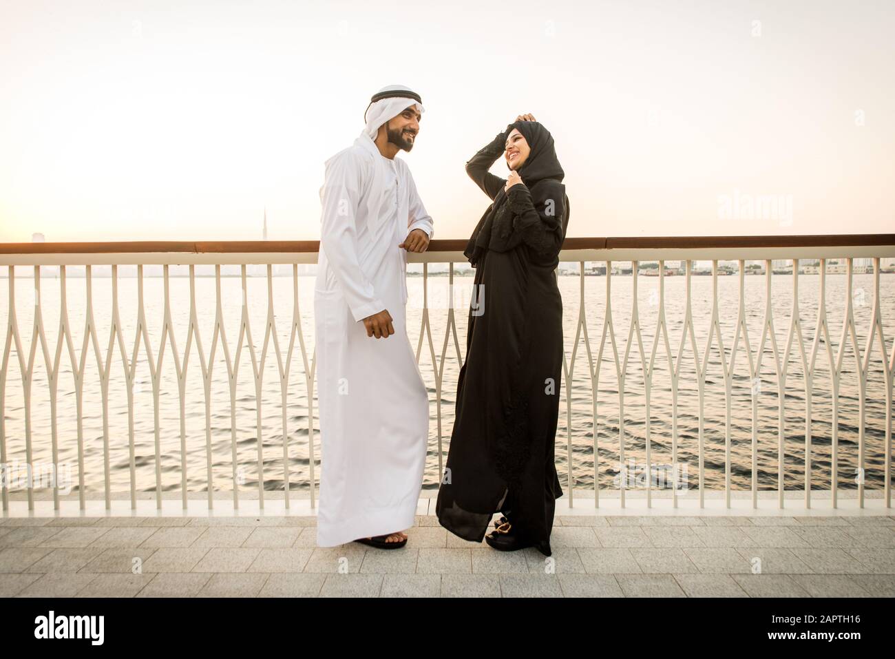 Beautiful middle eastern couple dating outdoors in Dubai - Married pair ...