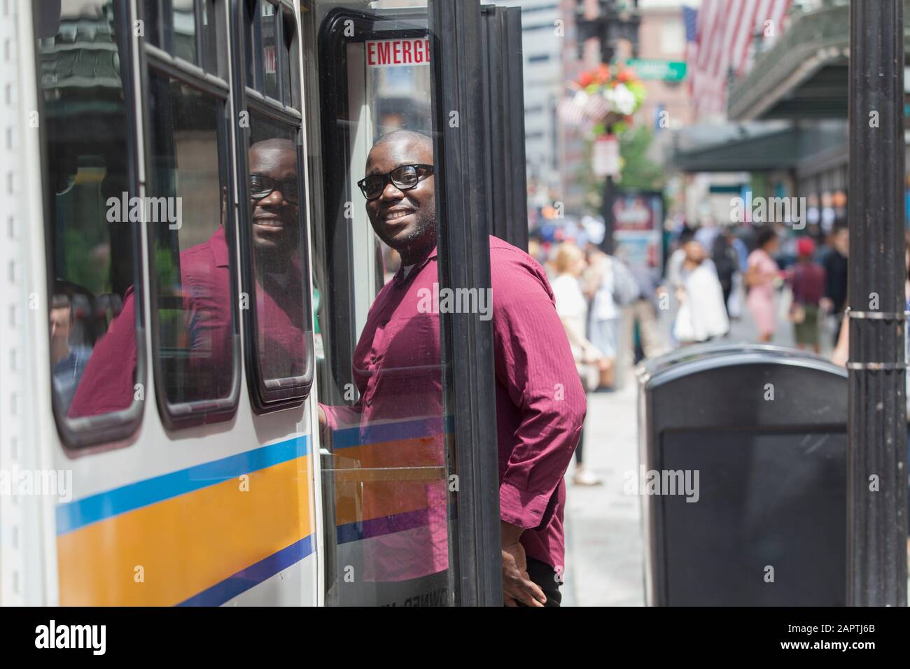Man getting on bus hi-res stock photography and images - Alamy