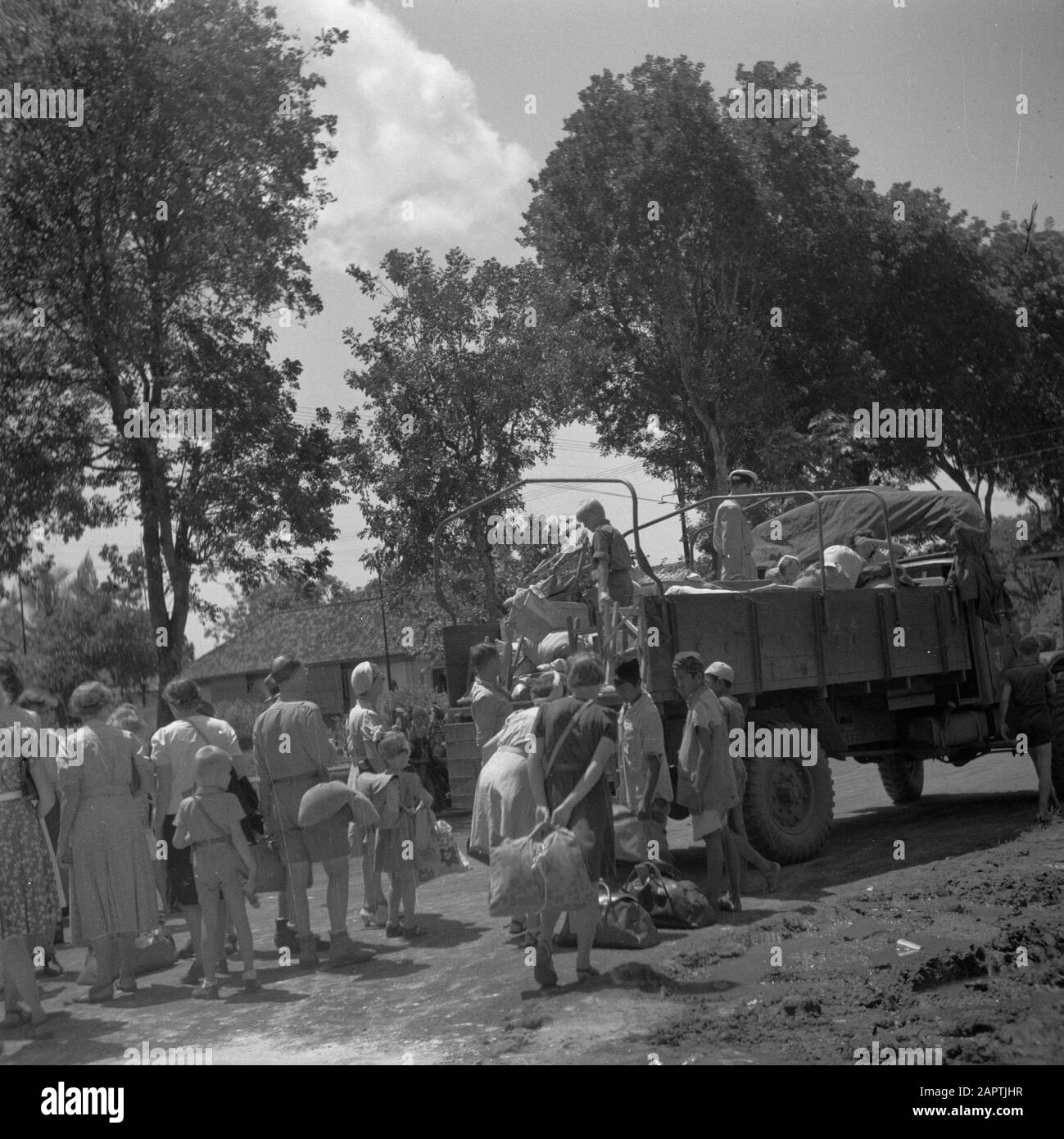 War Volunteers in Malacca and Indonesia Loading trucks at the Adek camp ...