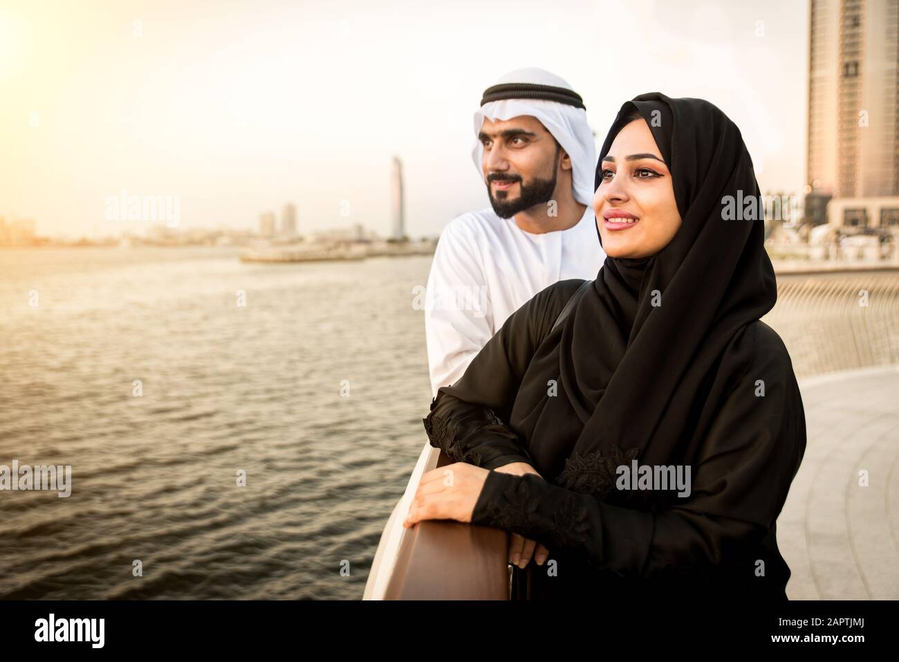 Beautiful middle eastern couple dating outdoors in Dubai - Married pair ...