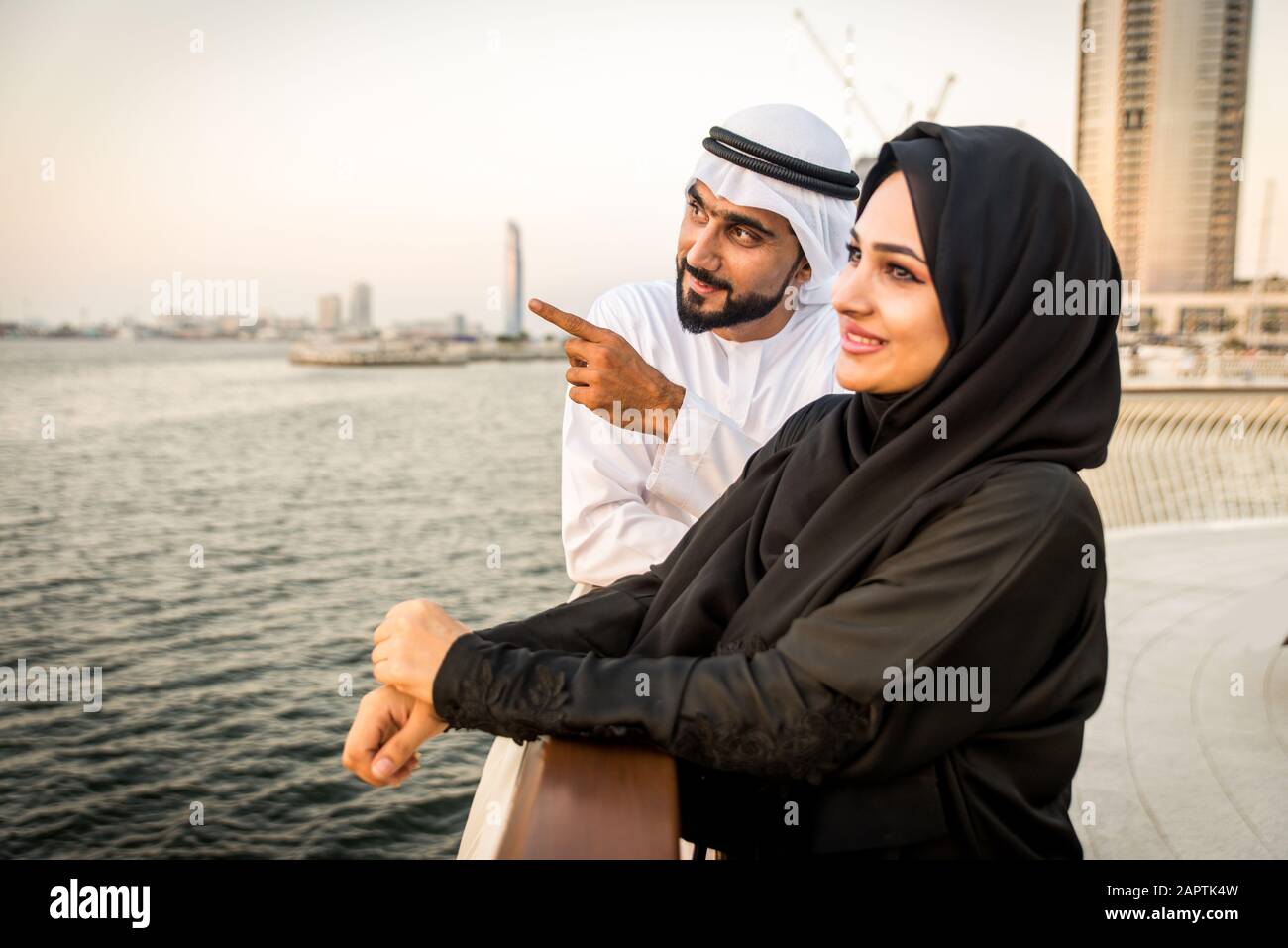 Beautiful middle eastern couple dating outdoors in Dubai - Married pair ...