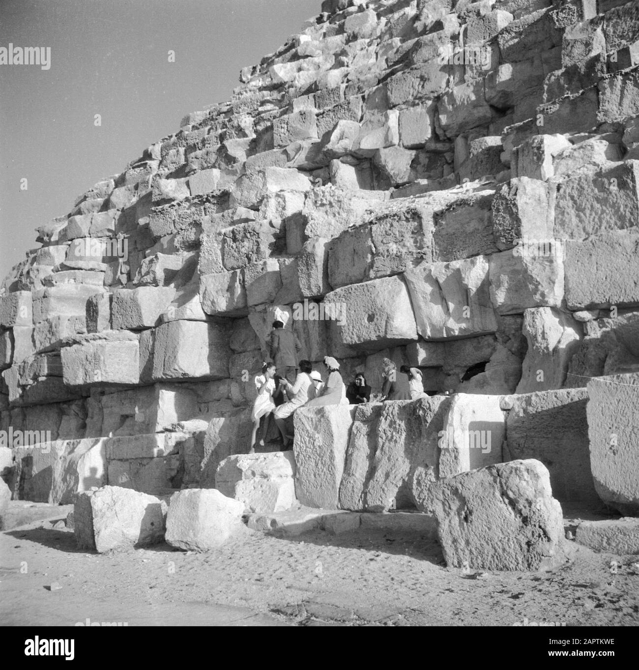 The lower part of one of the pyramids accompanied by a company led by ...