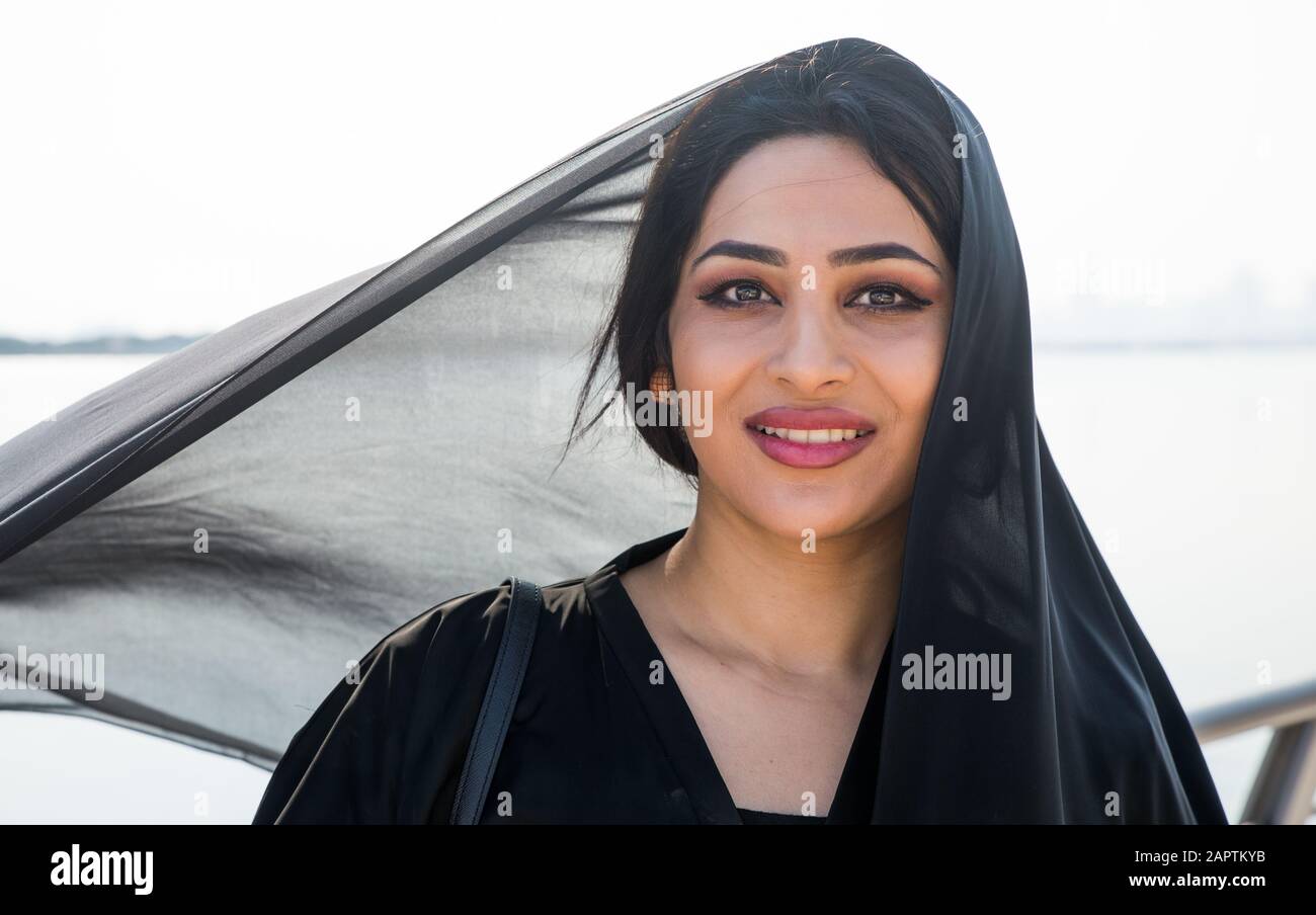 Beautiful middle eastern couple dating outdoors in Dubai - Married pair ...