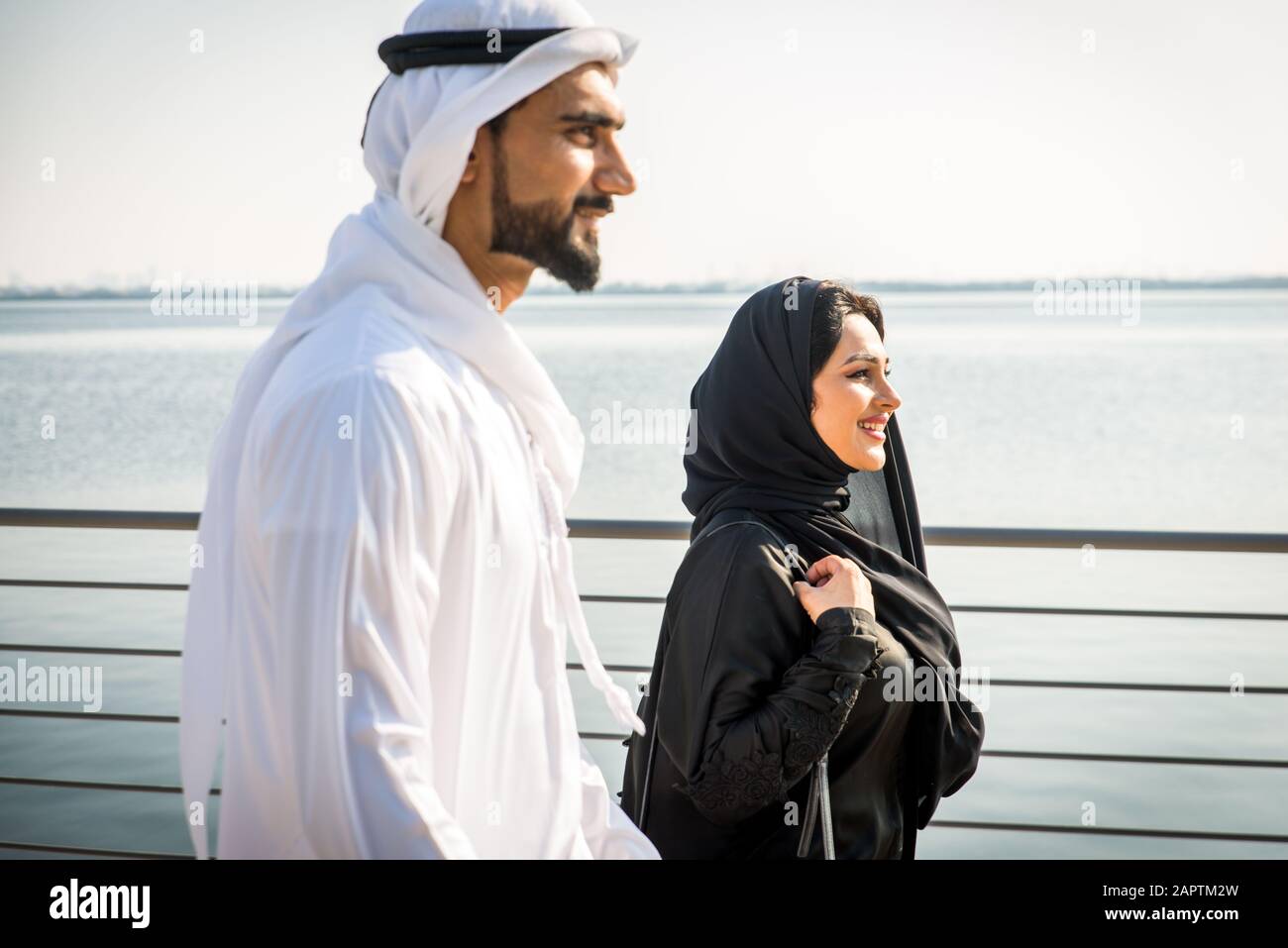 Beautiful middle eastern couple dating outdoors in Dubai - Married pair ...