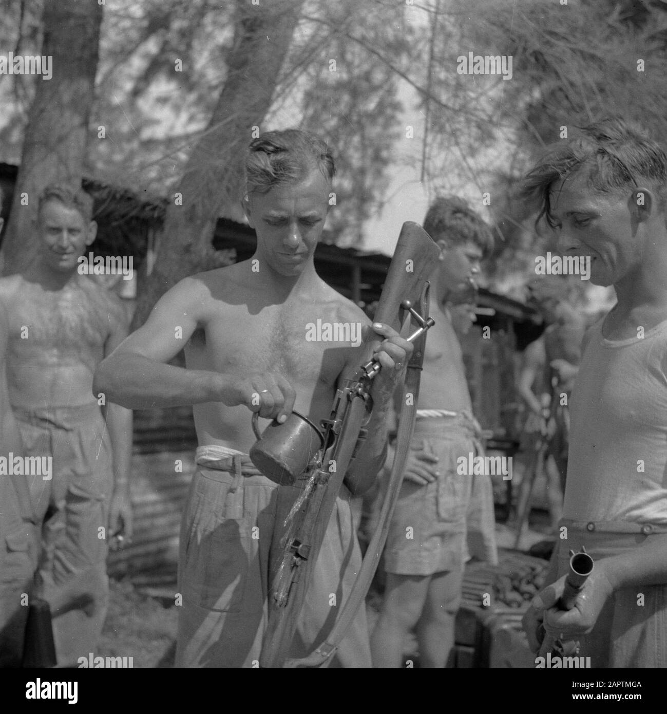 War Volunteers in Malacca and Indonesia Flushing weapons with lukewarm ...