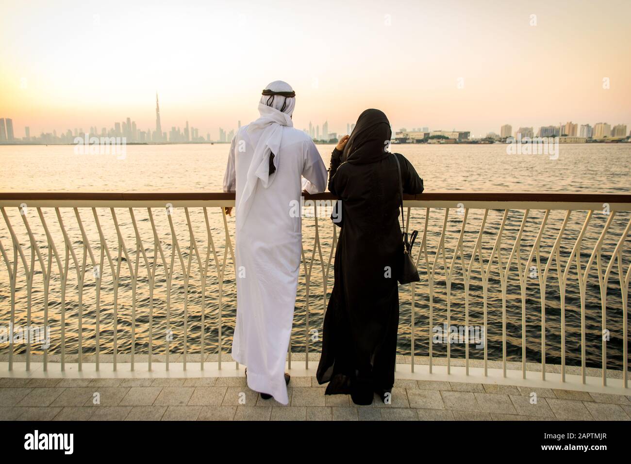 Beautiful middle eastern couple dating outdoors in Dubai - Married pair ...