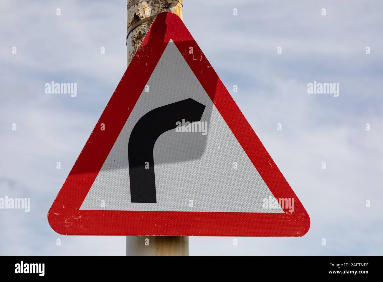 triangular road sign indicating sharp bend wirral 2019 Stock Photo - Alamy