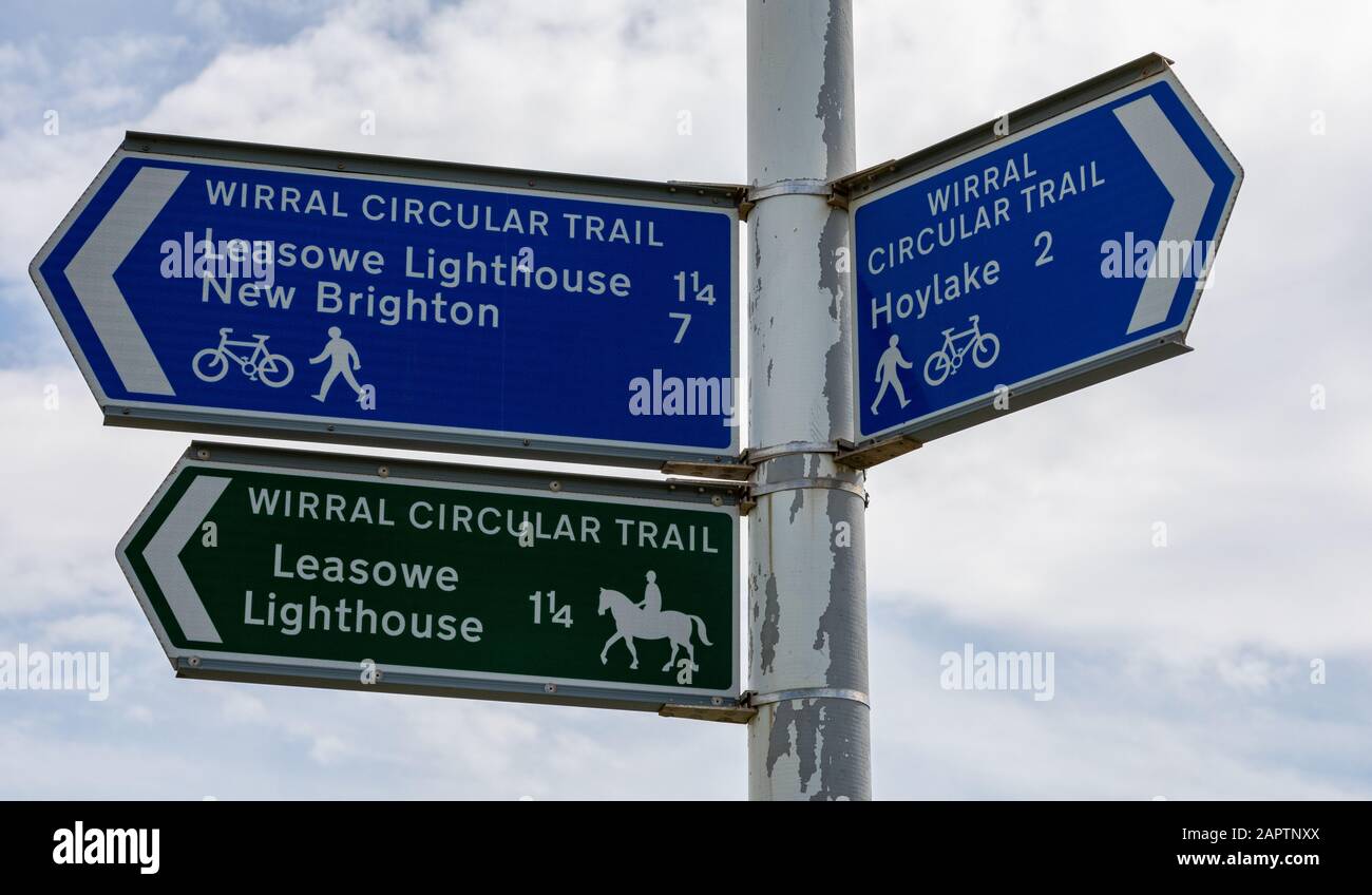 Blue and black signs for footpaths and cyclepaths at Leasowe Wirral ...