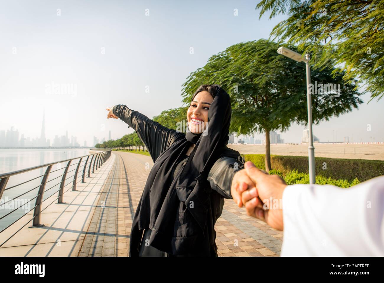 Beautiful middle eastern couple dating outdoors in Dubai - Married pair ...