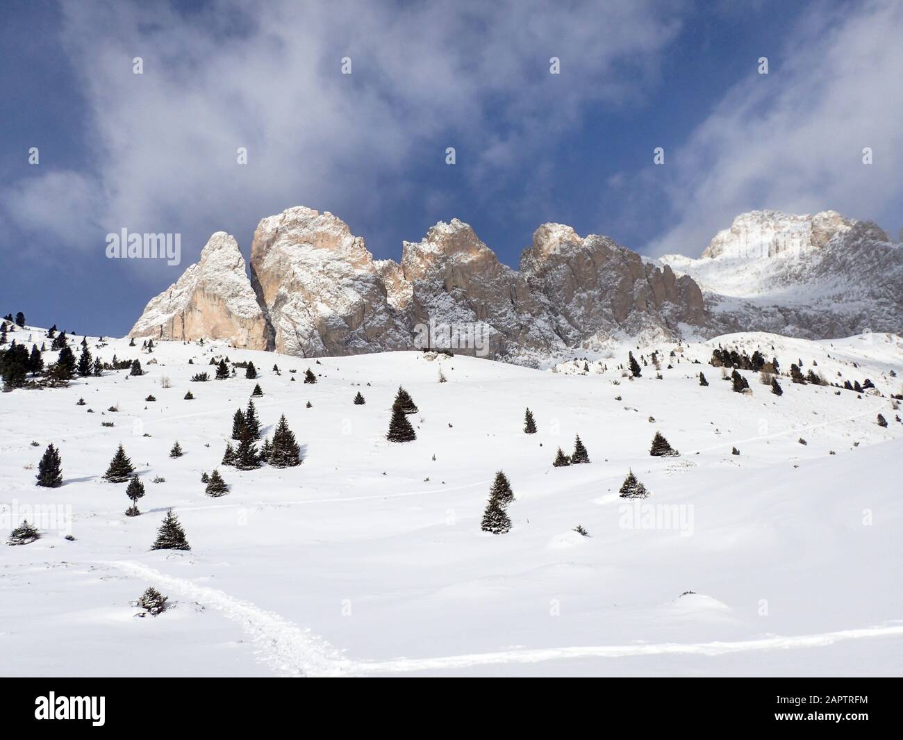 Selva di Valgardena, Italy: panorama of the snowy Dolomites Stock Photo ...