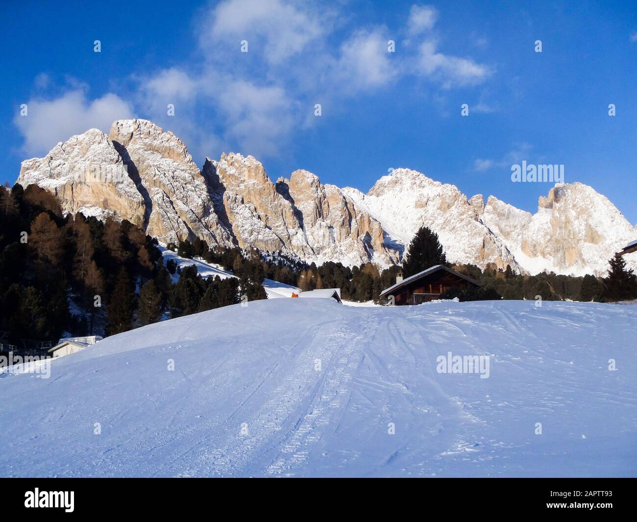 Selva di Valgardena, Italy: panorama of the snowy Dolomites Stock Photo ...