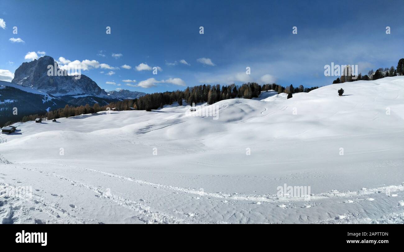 Selva di Valgardena, Italy: panorama of the snowy Dolomites Stock Photo ...
