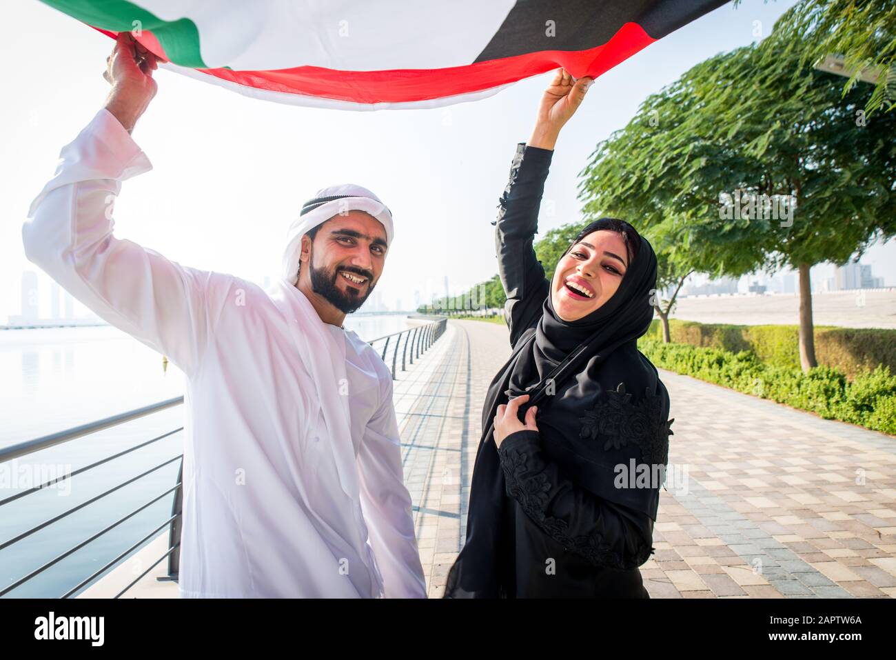 Beautiful middle eastern couple dating outdoors in Dubai - Married pair ...