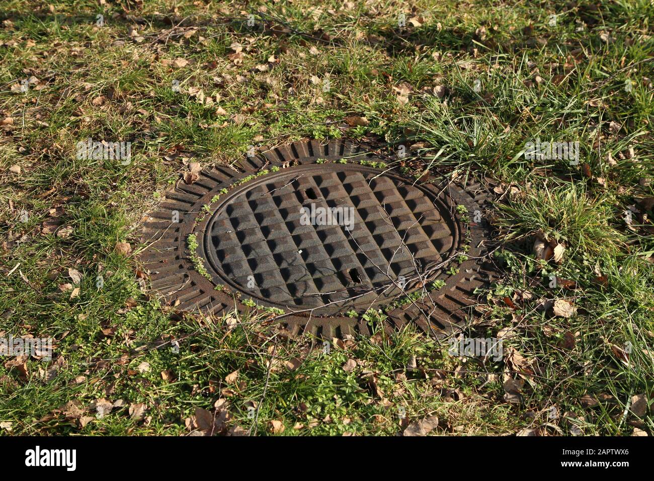 Open manhole grass hi-res stock photography and images - Alamy