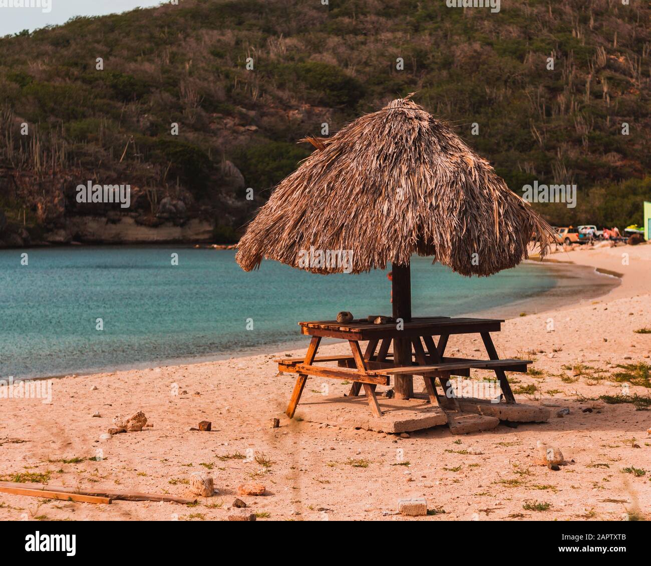 Playa Santa Cruz beach in Curacao. Bamboo beach umbrella hut Stock ...