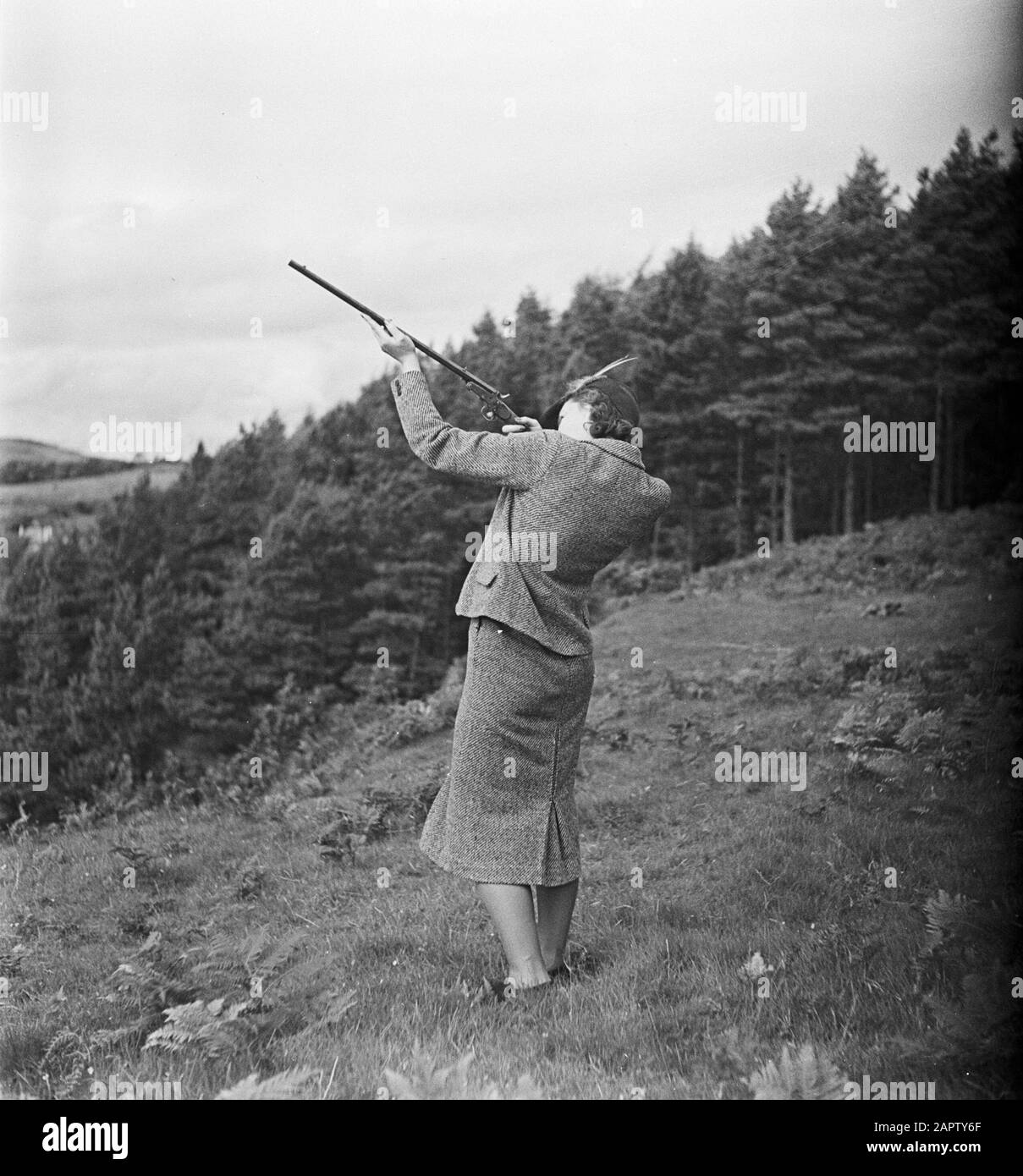 Grouse hunting on Skye Hunting. Woman shooting with a shotgun on the ...