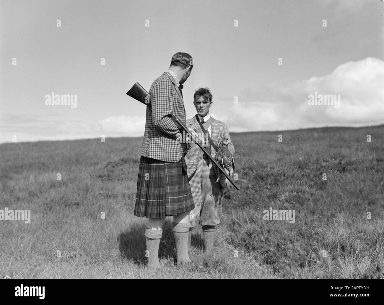 Scotland - The Highlands Hunters on Skye with a shot bird Date: undated ...
