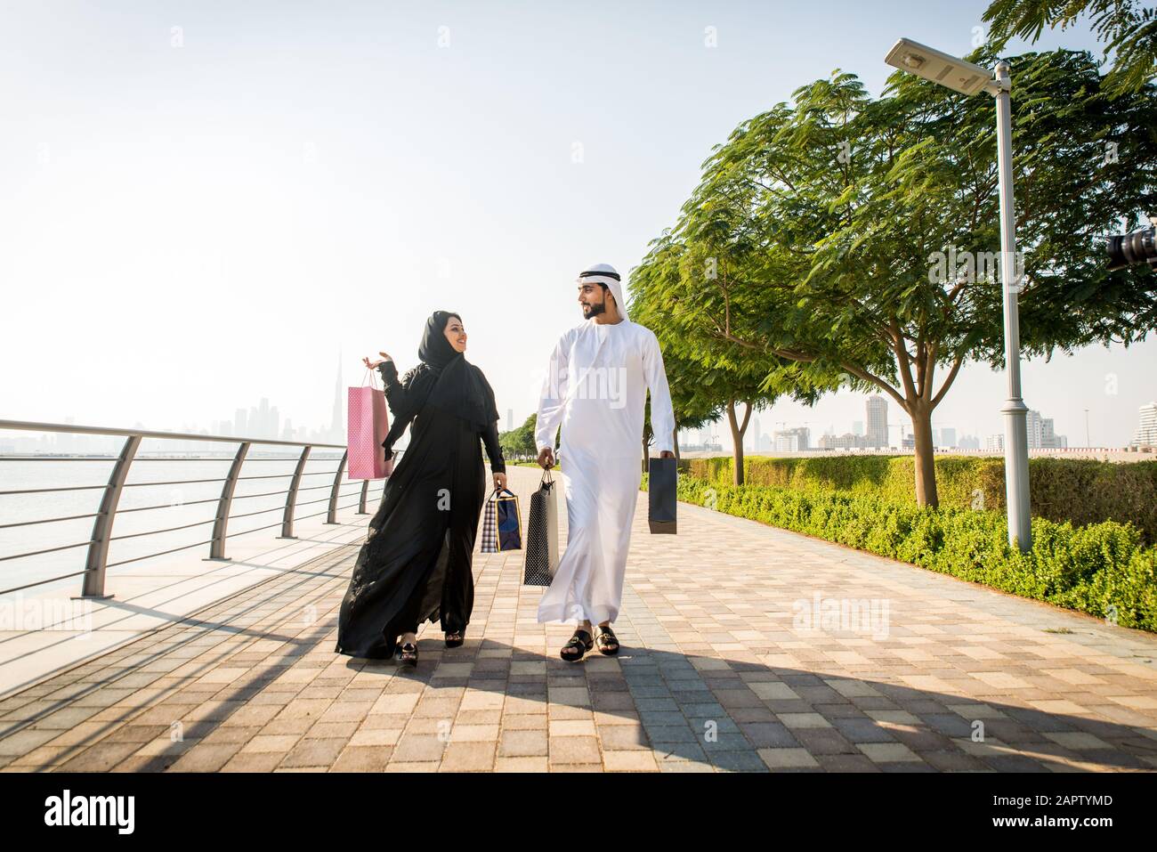 Beautiful middle eastern couple dating outdoors in Dubai - Married pair ...