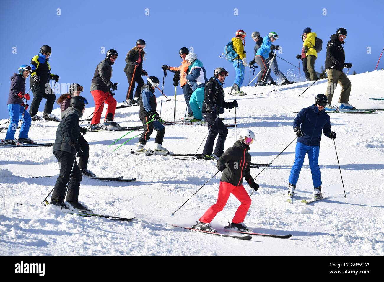 Overcrowded ski slope, crowds, helmet, helmets. Skiers in the ...
