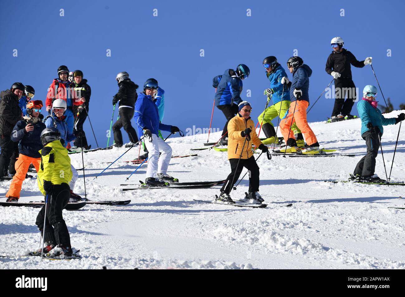 Overcrowded ski slope, crowds, helmet, helmets. Skiers in the ...