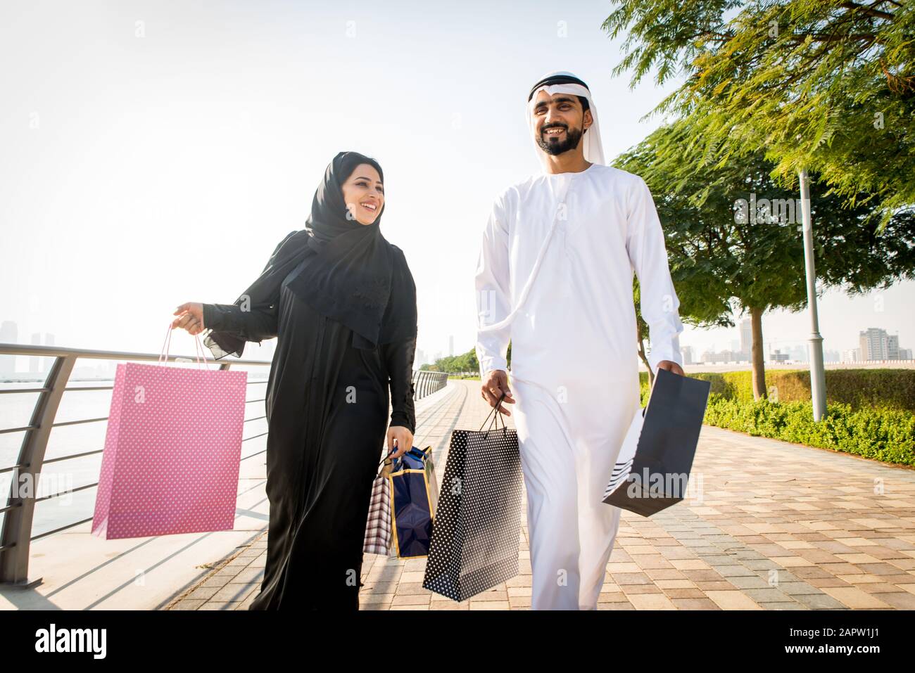 Beautiful middle eastern couple dating outdoors in Dubai - Married pair ...