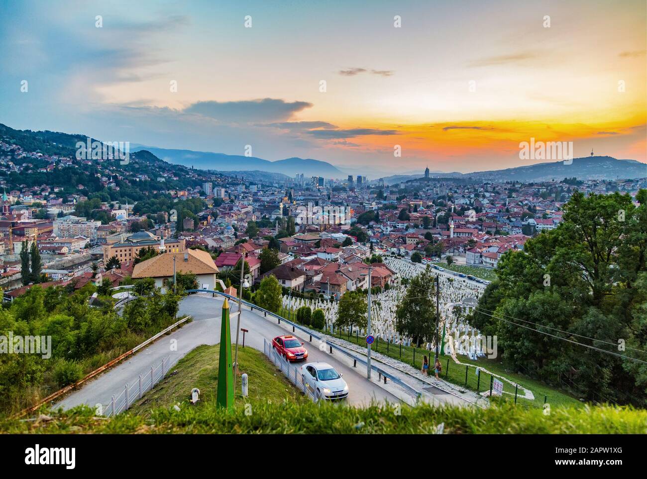 Sunset view of Sarajevo from most popular panoramic spot place.Yellow ...