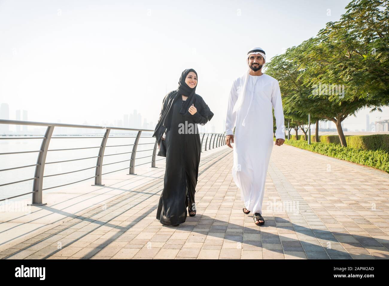 Beautiful middle eastern couple dating outdoors in Dubai - Married pair ...