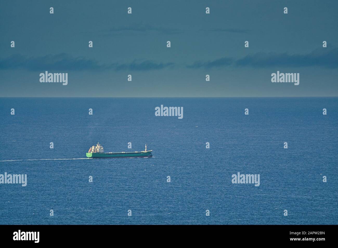 Ship in the open ocean Stock Photo - Alamy