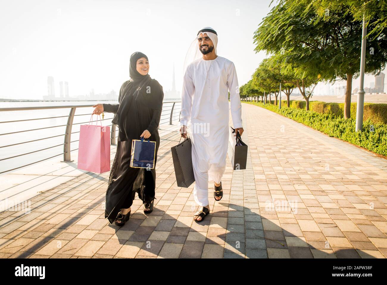 Beautiful middle eastern couple dating outdoors in Dubai - Married pair ...