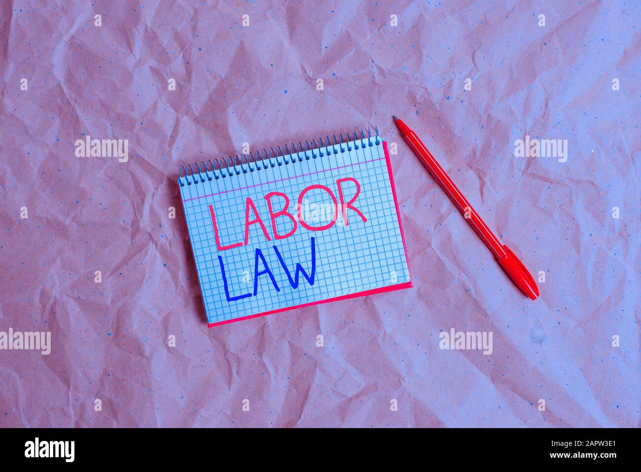 Writing note showing Labor Law. Business concept for rules relating to ...