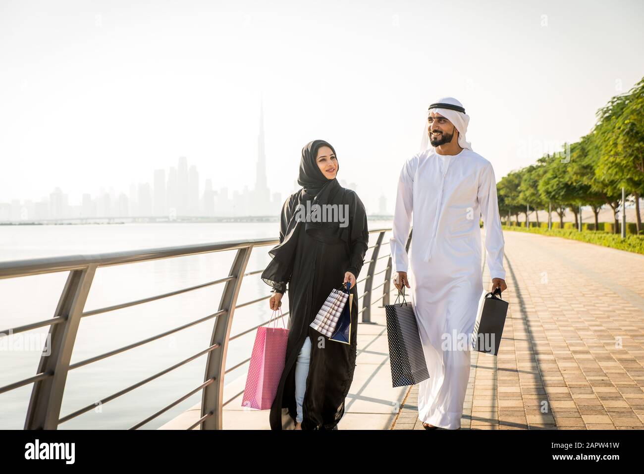 Beautiful middle eastern couple dating outdoors in Dubai - Married pair ...