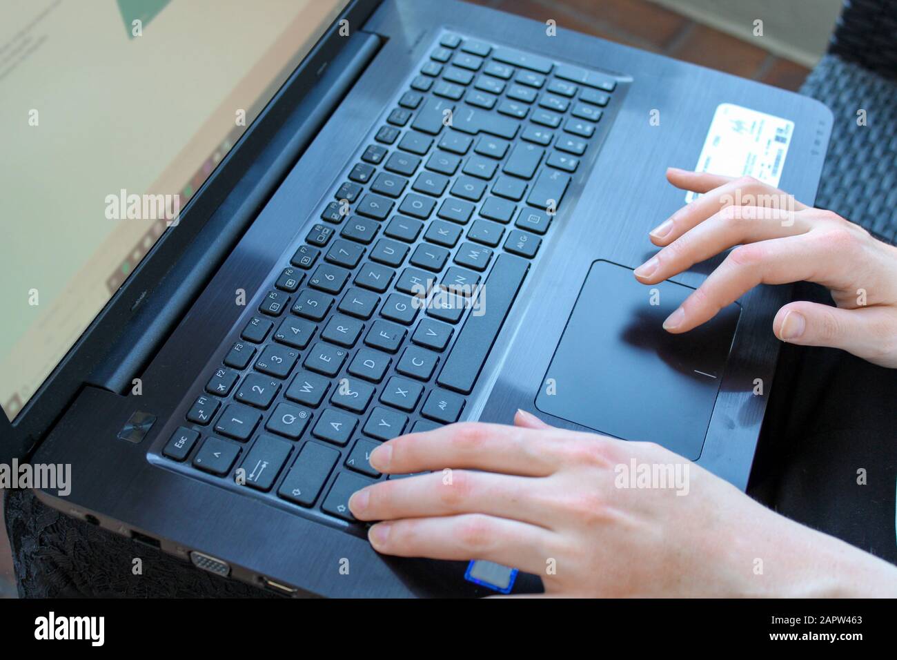 Female hands typing and clicking shift on black laptop close-up Stock ...