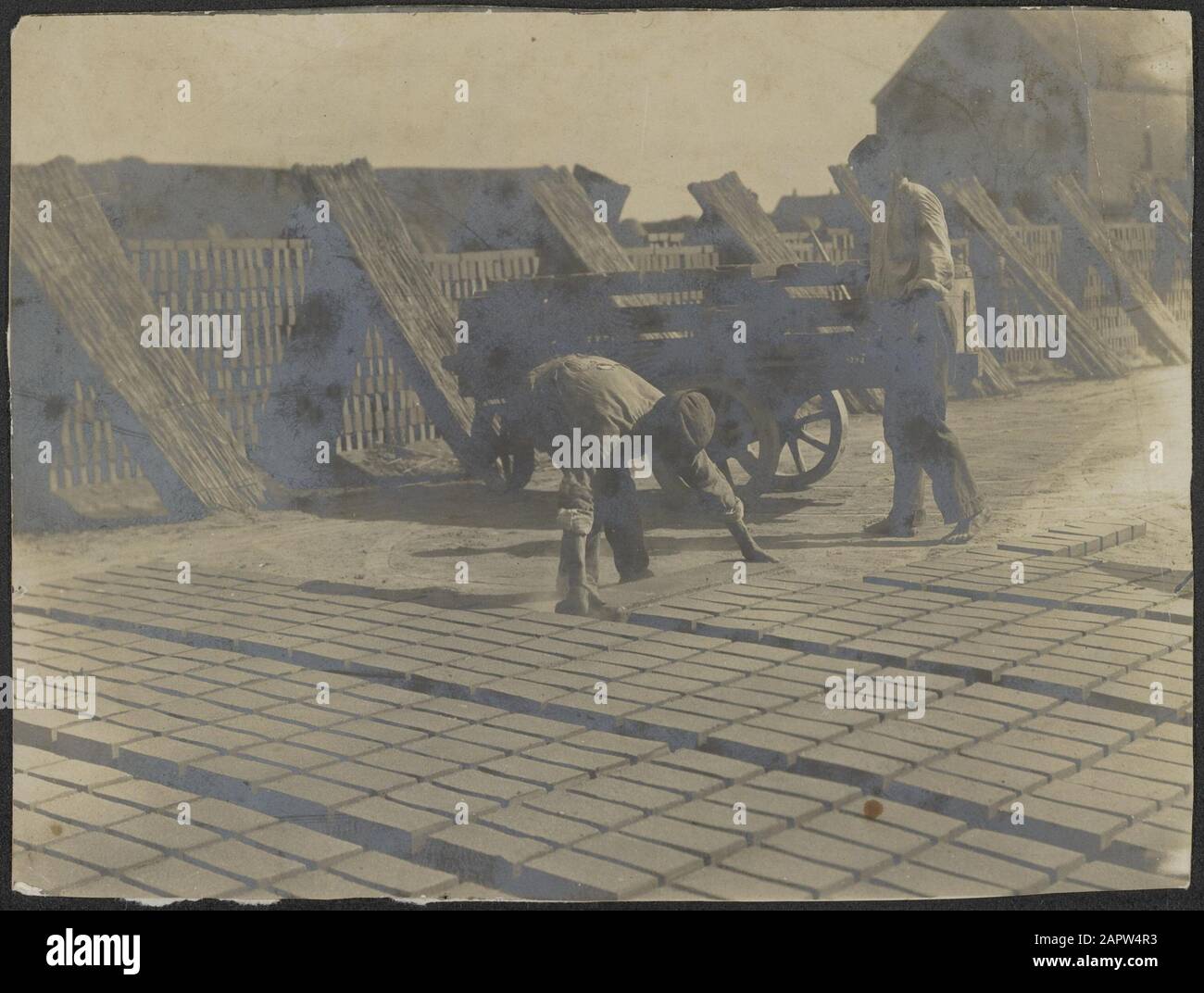 Turning of the stone forms at the drying site Date: undated Keywords ...